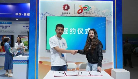第二十八届北京科博会成果丰硕 和田签约金额超10亿元-中新网·新疆